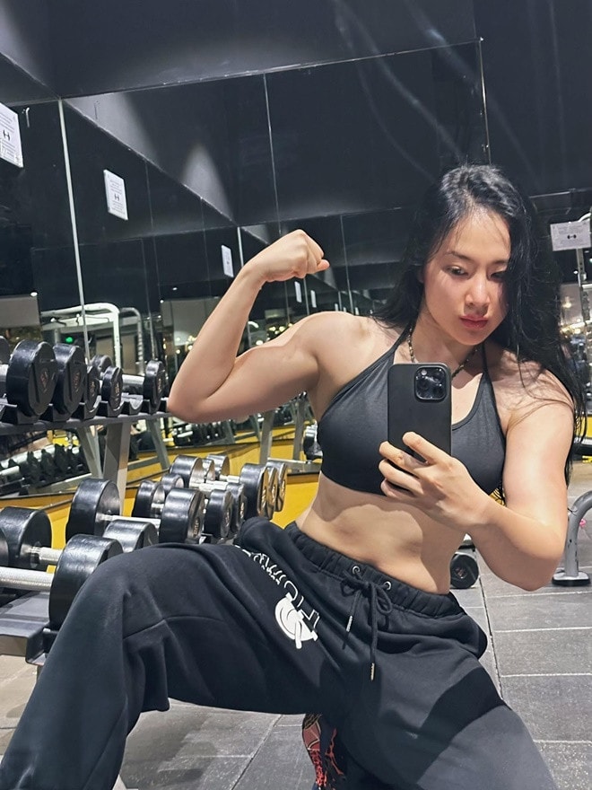 Angela Phuong Trinh wears men's clothing after toning her body